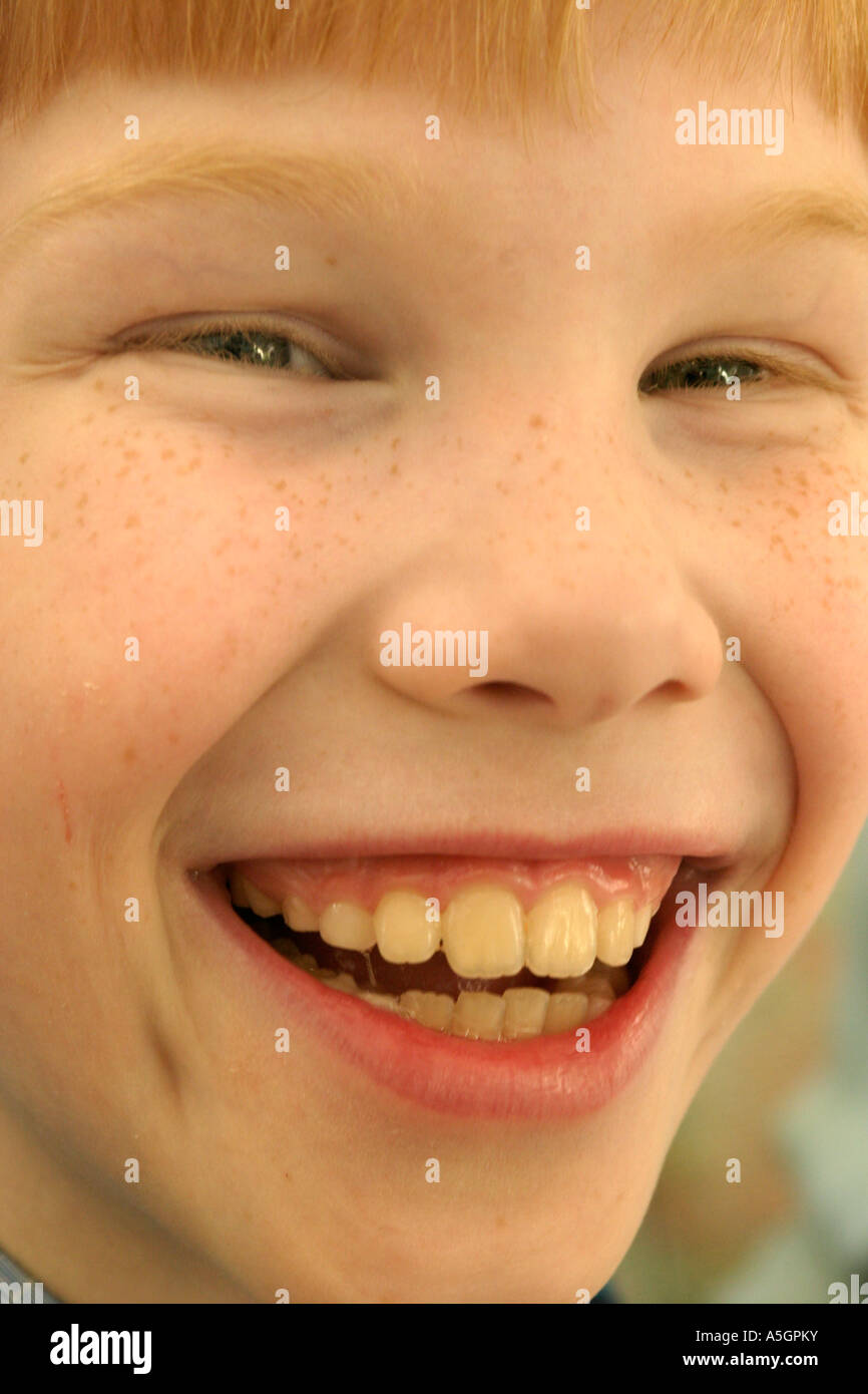 portrait of a young smiling boy with freckles Stock Photo - Alamy