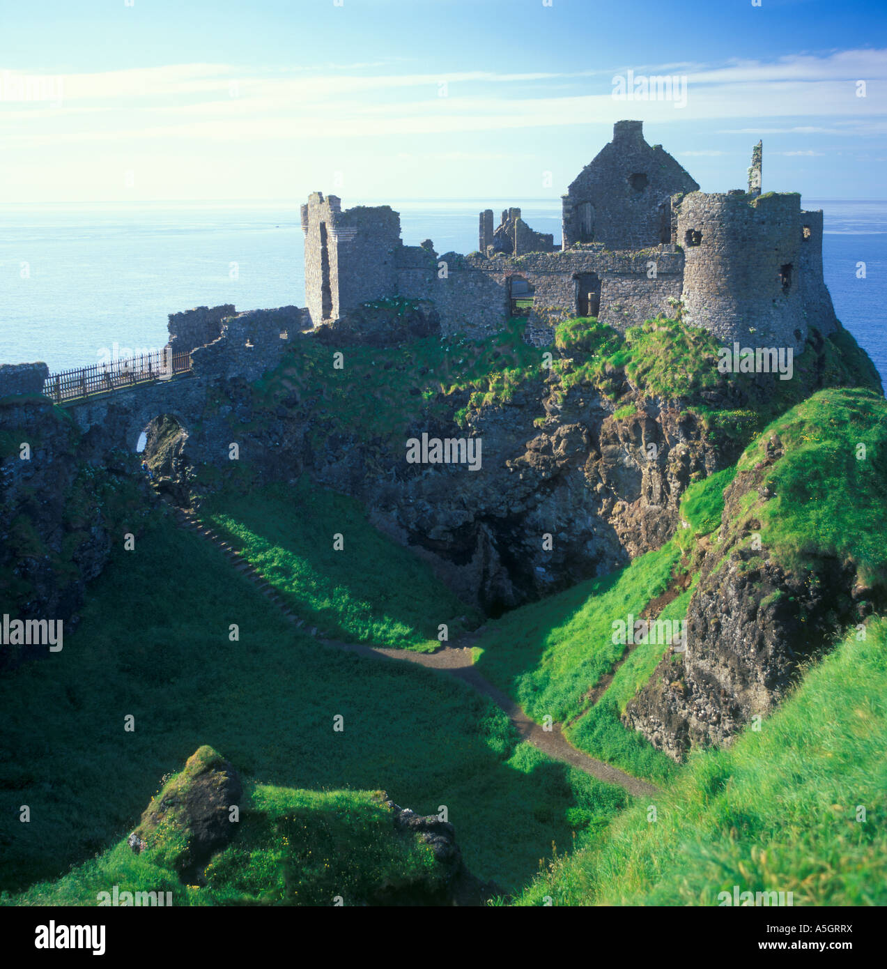 the ruins of Dunluce Castle at the Causeway Coast in County Antrim in ...