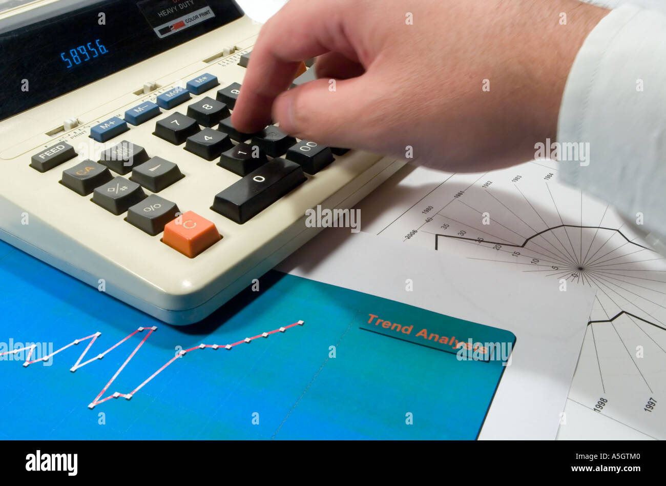 using a calculator Stock Photo - Alamy