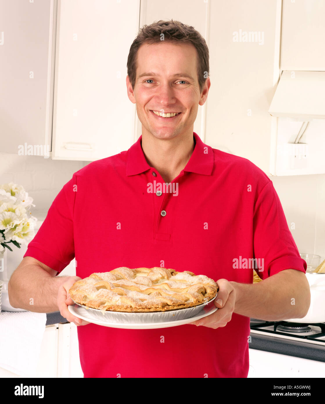 Man holding apple pie apple fruit hi-res stock photography and images ...