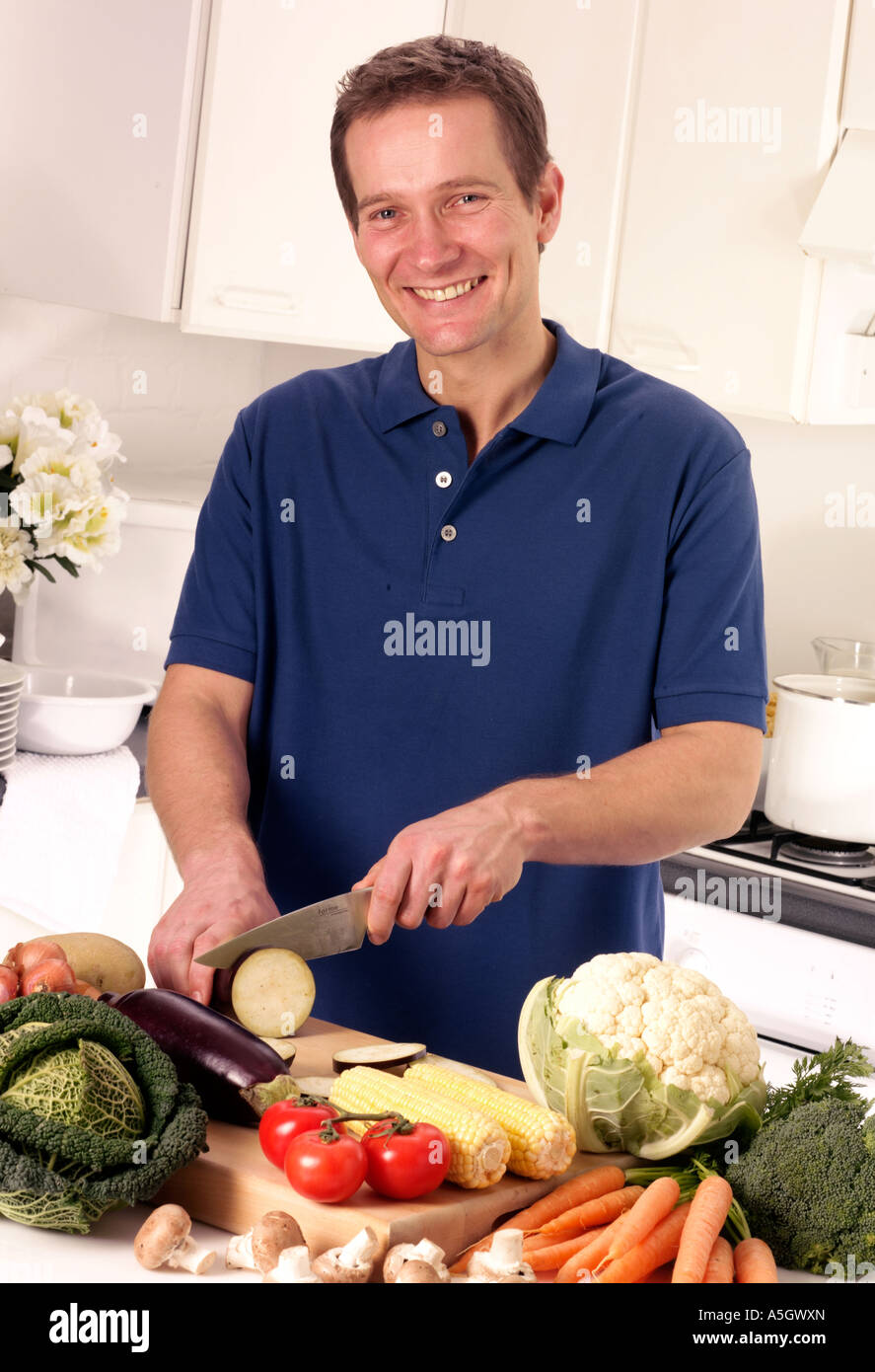 Person dicing vegetables hi-res stock photography and images - Alamy