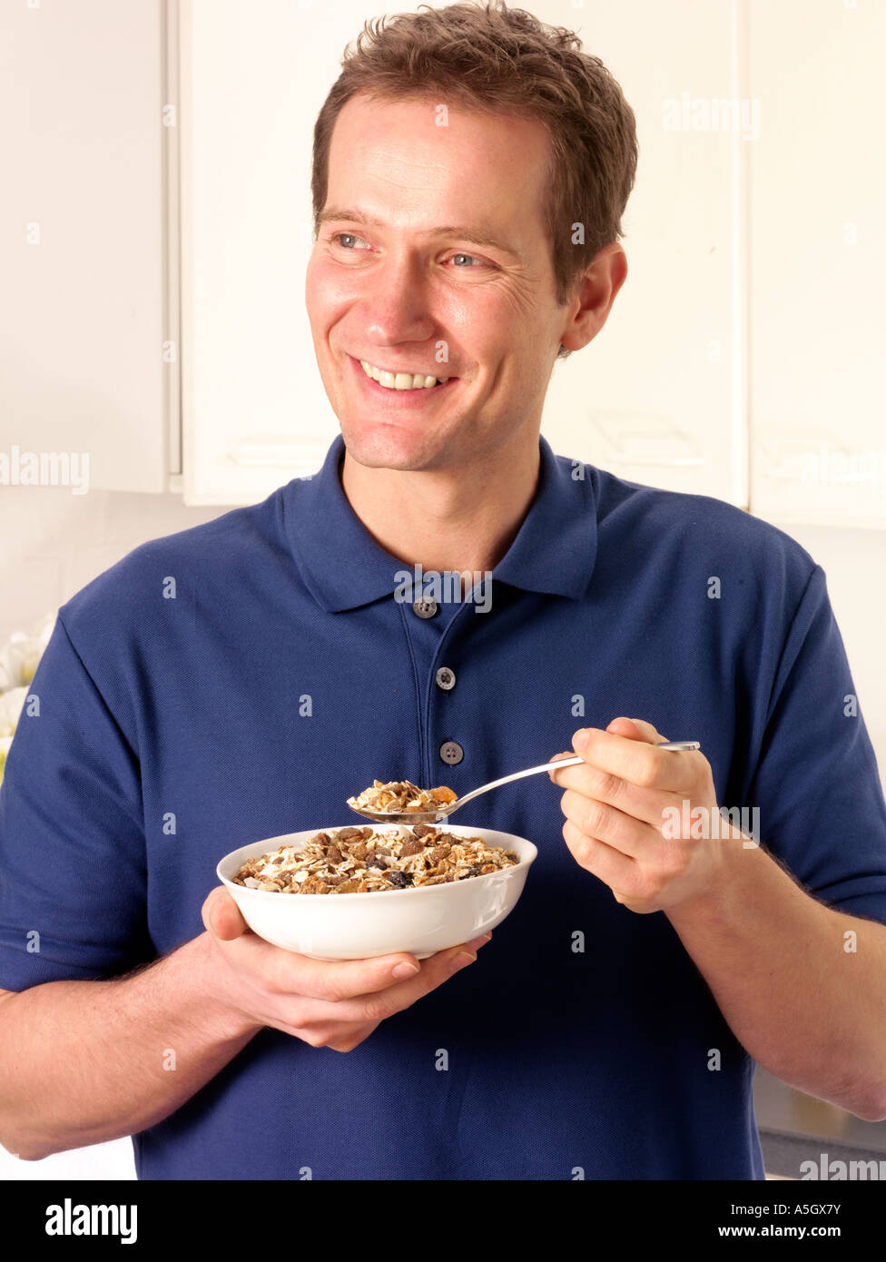 Man eating dried fruit not woman hi-res stock photography and images ...