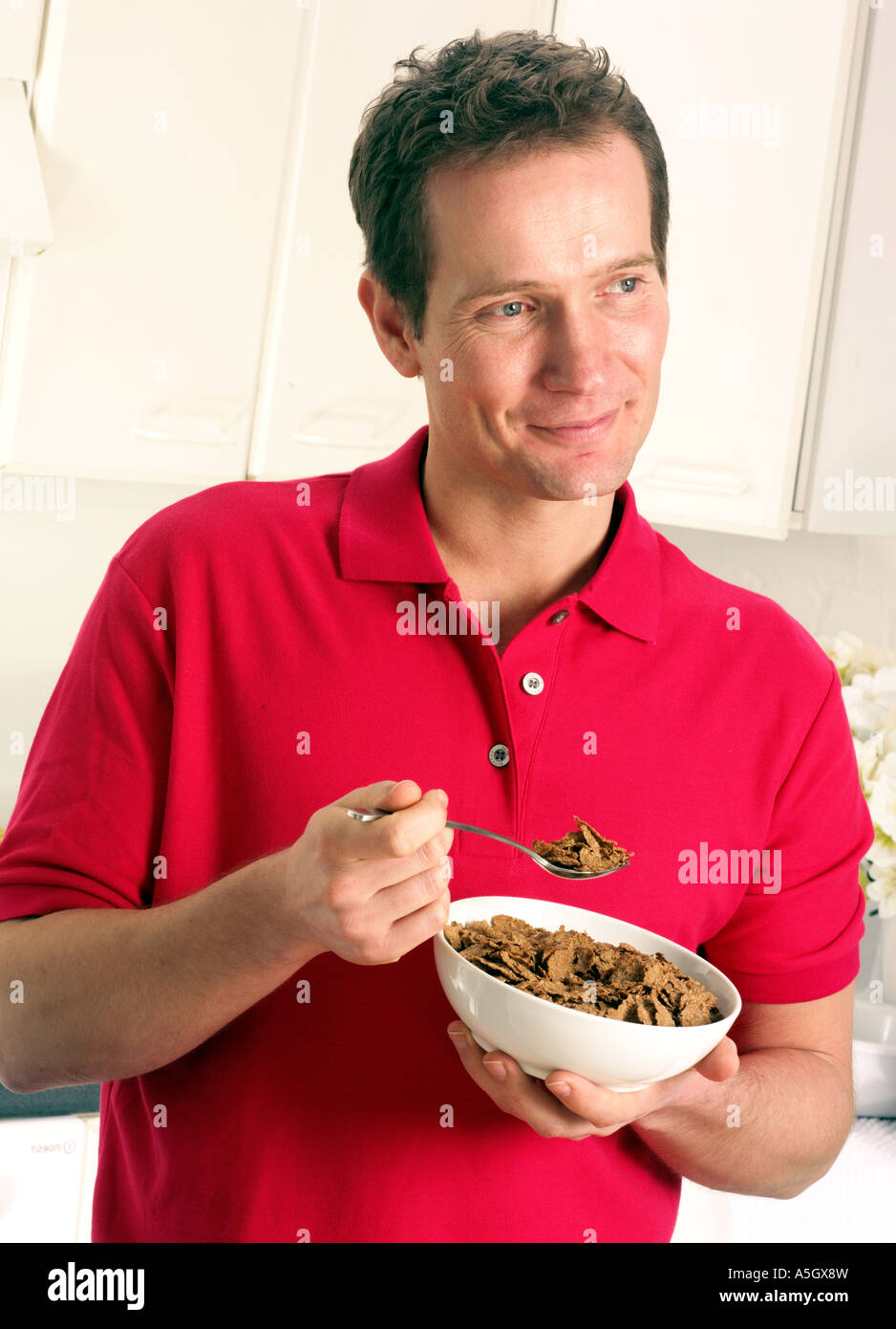 Man eating cereal hi-res stock photography and images - Alamy
