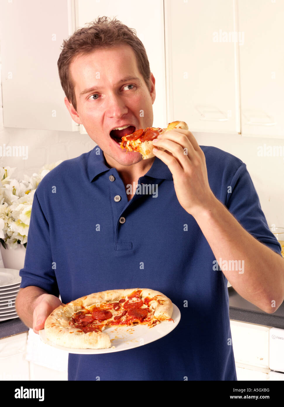 Adult overeating meal alone hi-res stock photography and images - Alamy