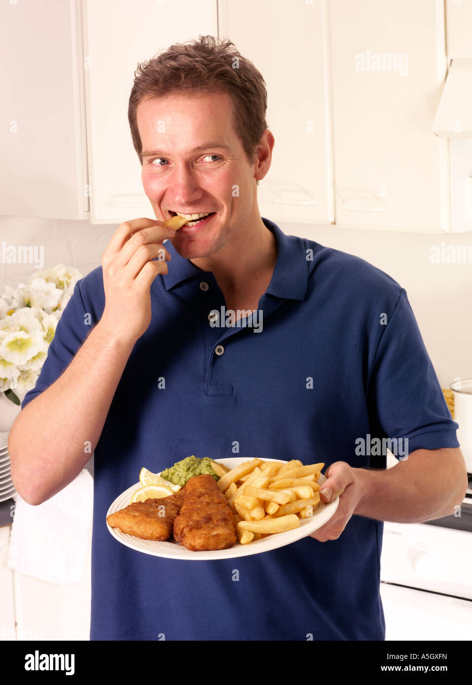 20s man eating fish hi-res stock photography and images - Alamy