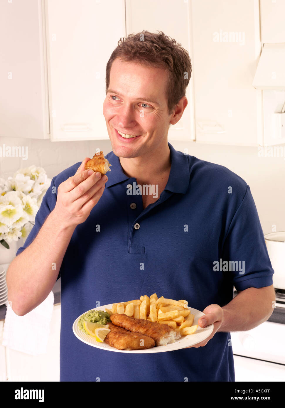 Man eating plate greasy food hi-res stock photography and images - Alamy