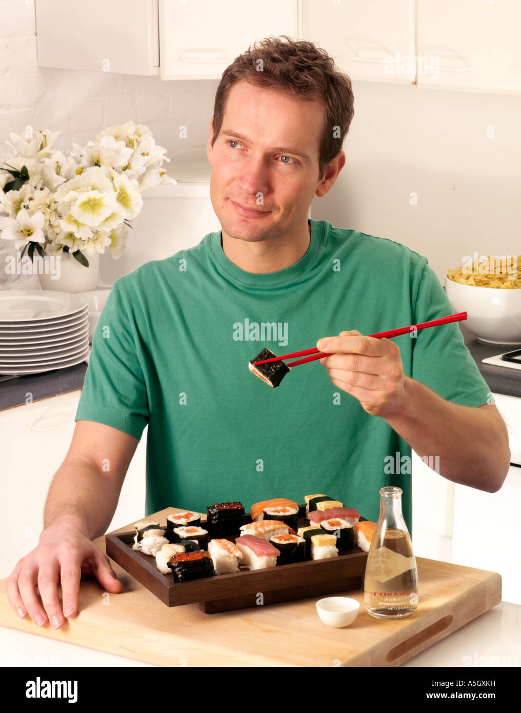 MAN EATING SUSHI Stock Photo - Alamy