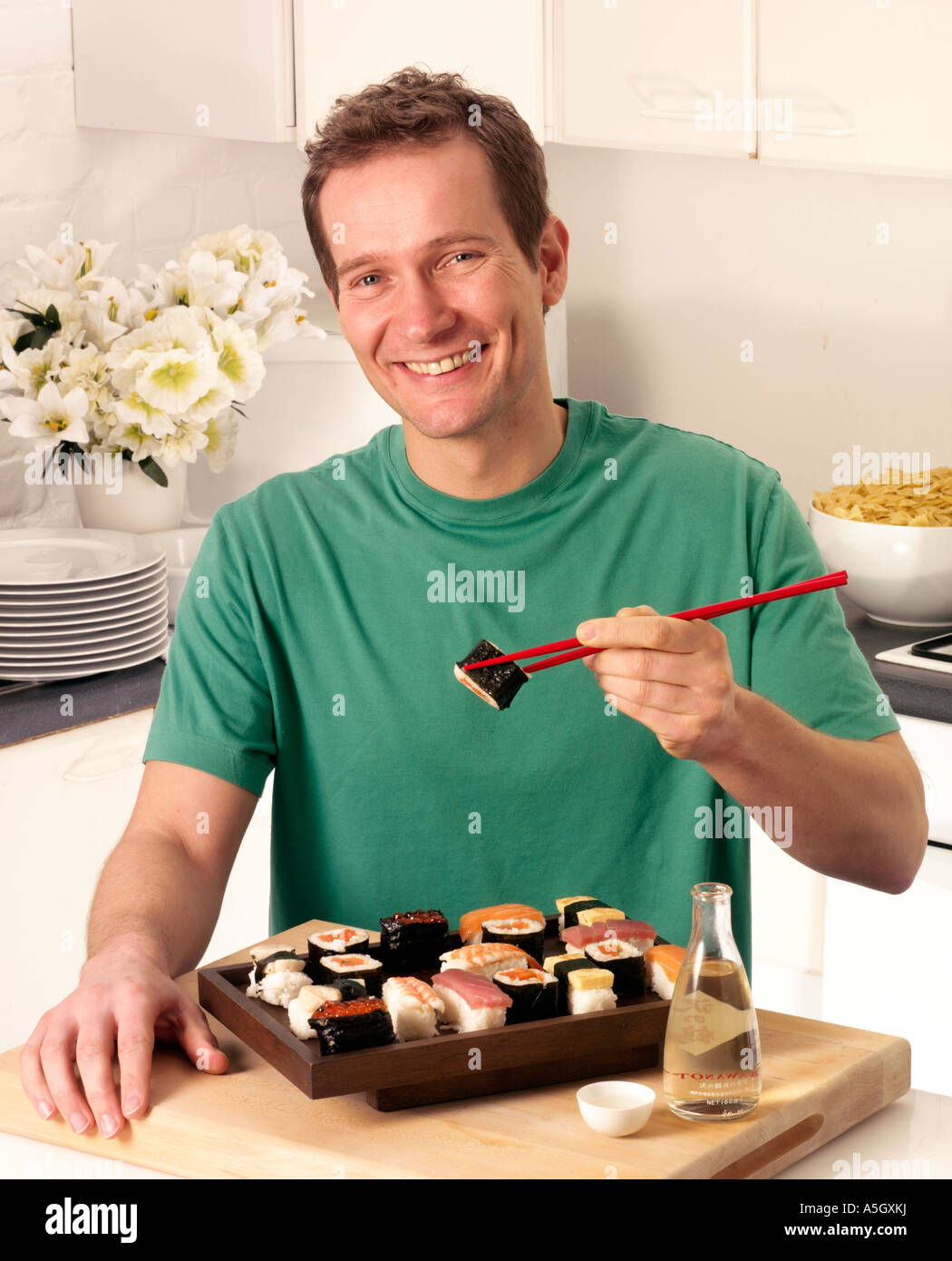 MAN EATING SUSHI Stock Photo - Alamy