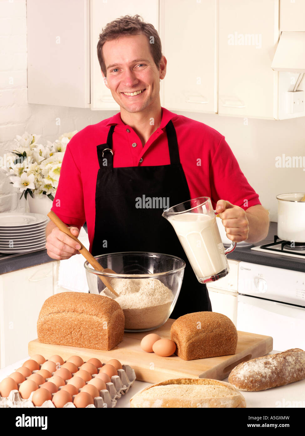 MAN BAKING IN KITCHEN Stock Photo - Alamy