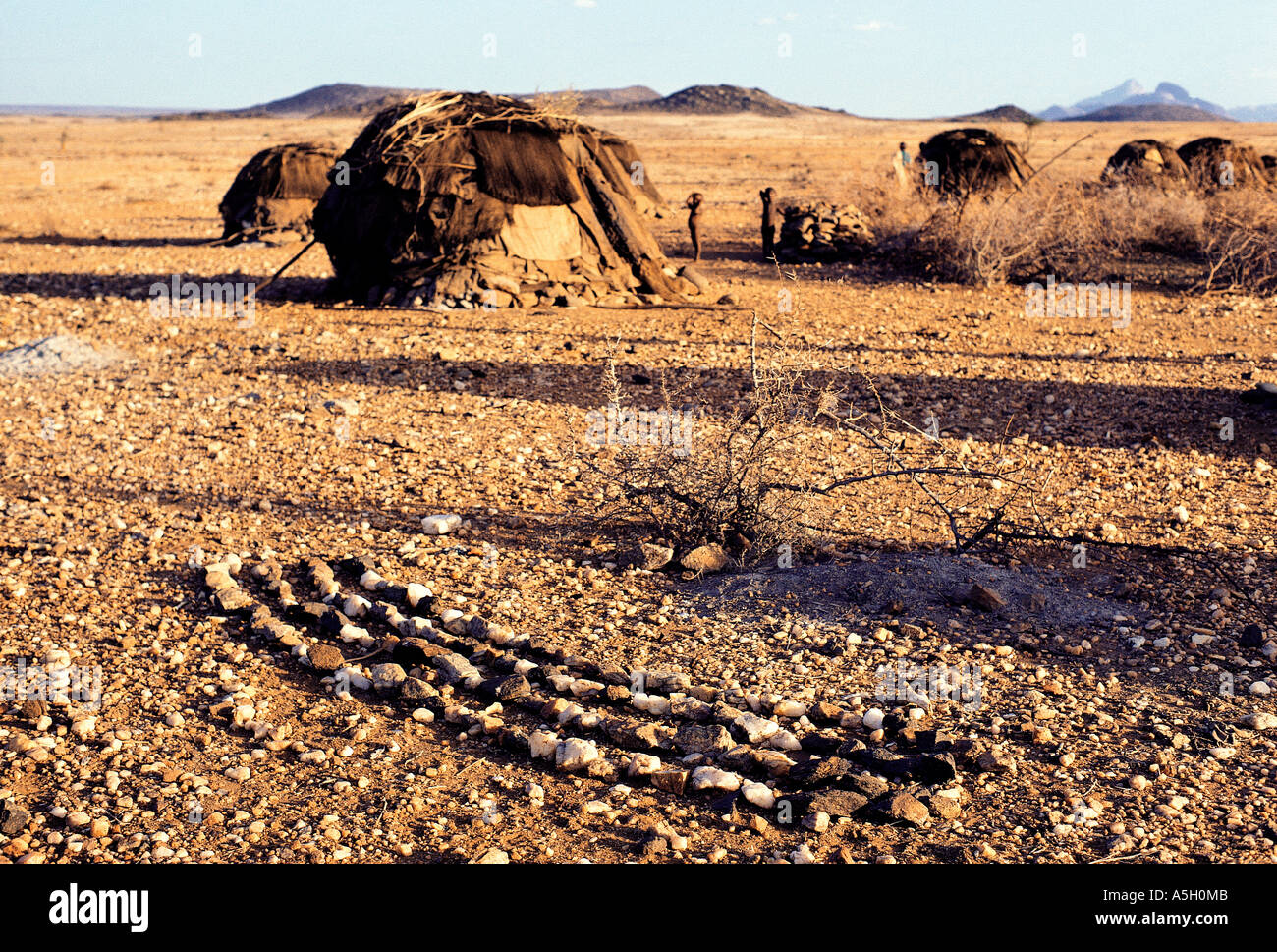 Lines of stones outside a Rendille hut to show that the family have ...