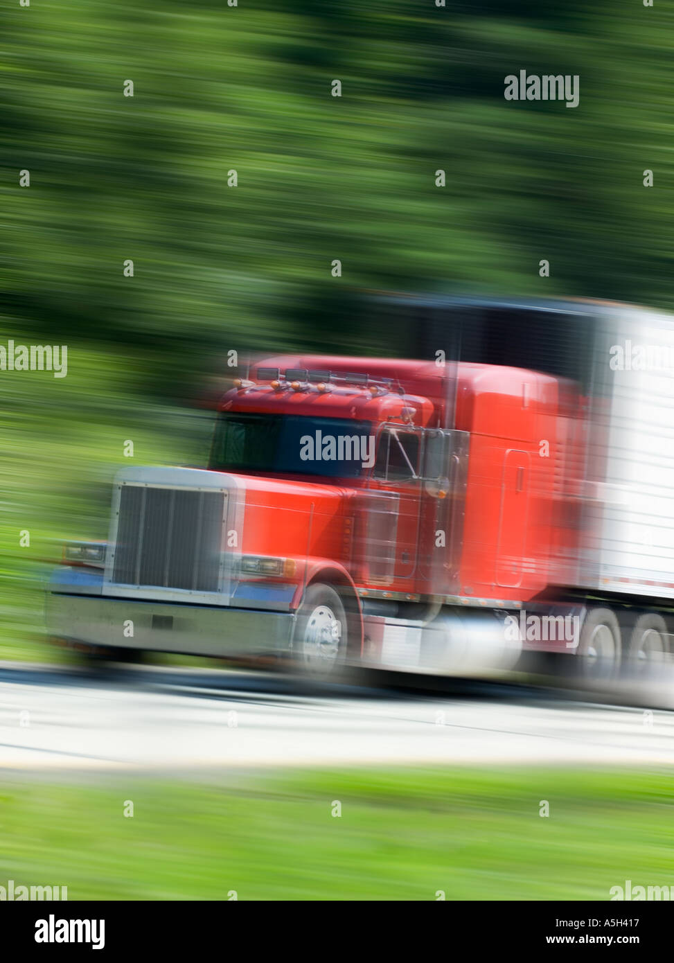 Semi trailer rolling down the highway Stock Photo - Alamy