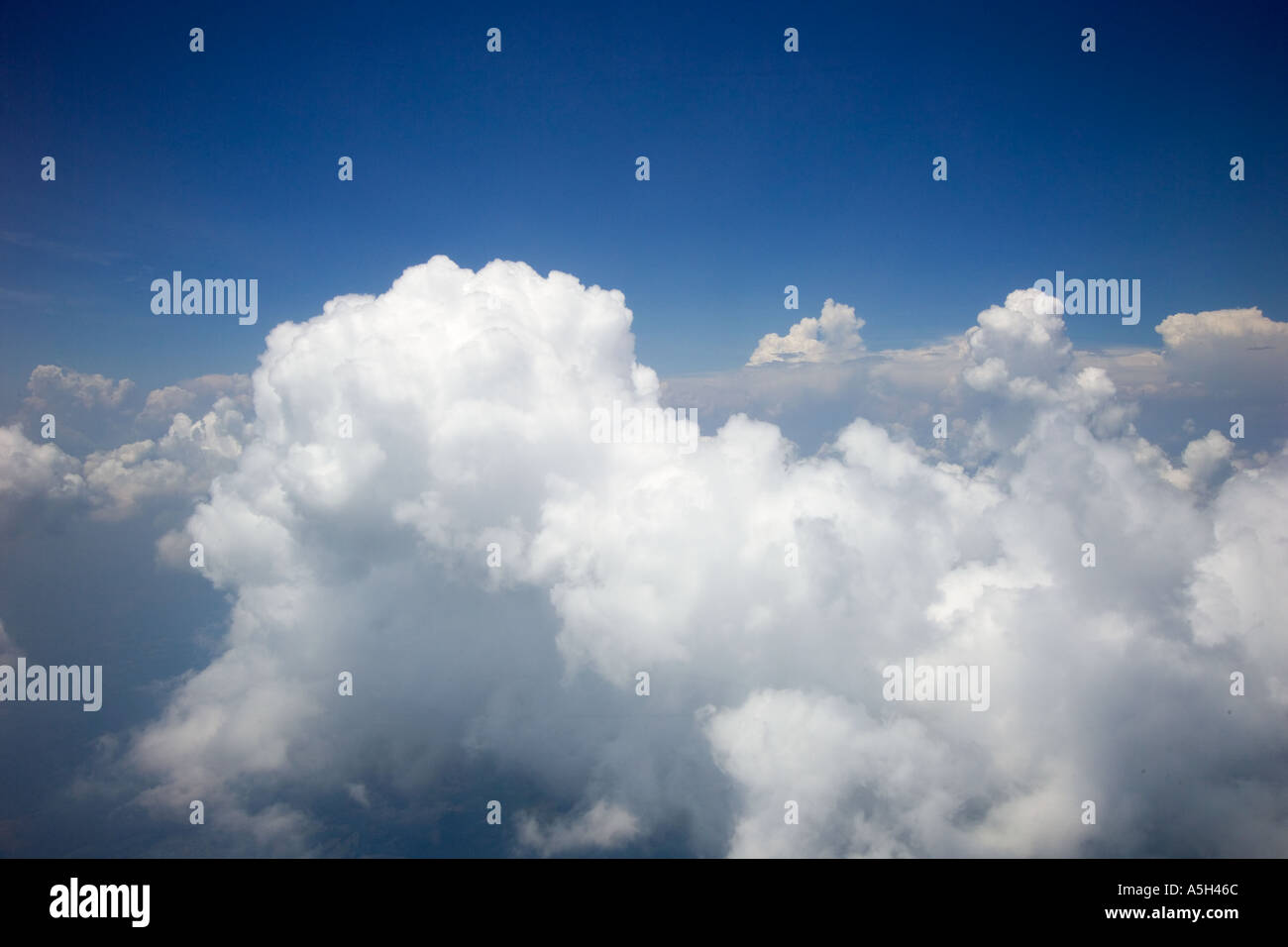 Wispy white clouds drift hi-res stock photography and images - Alamy