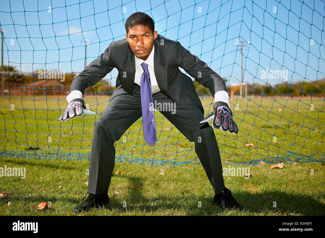 Man standing alone in stadium hi-res stock photography and images - Alamy