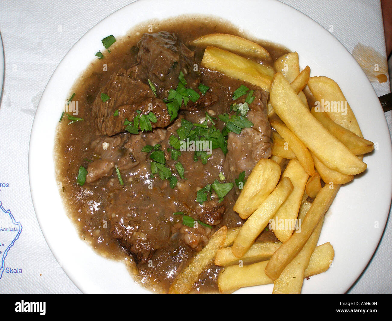 Greek dish, beef in lemon Stock Photo - Alamy