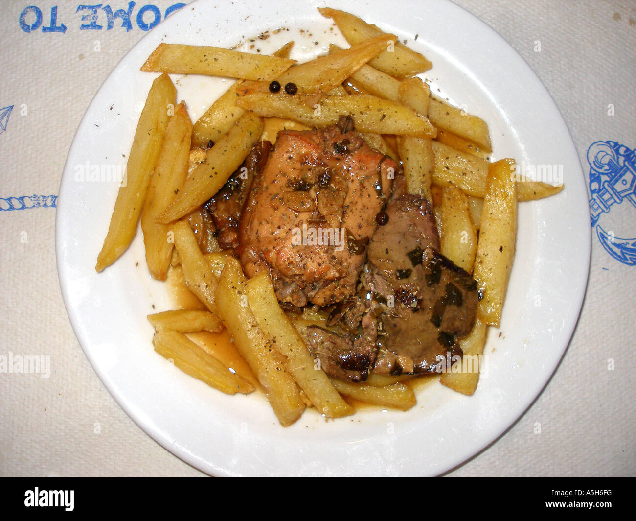 Greek dish, Rabbit in lemon sauce Stock Photo - Alamy