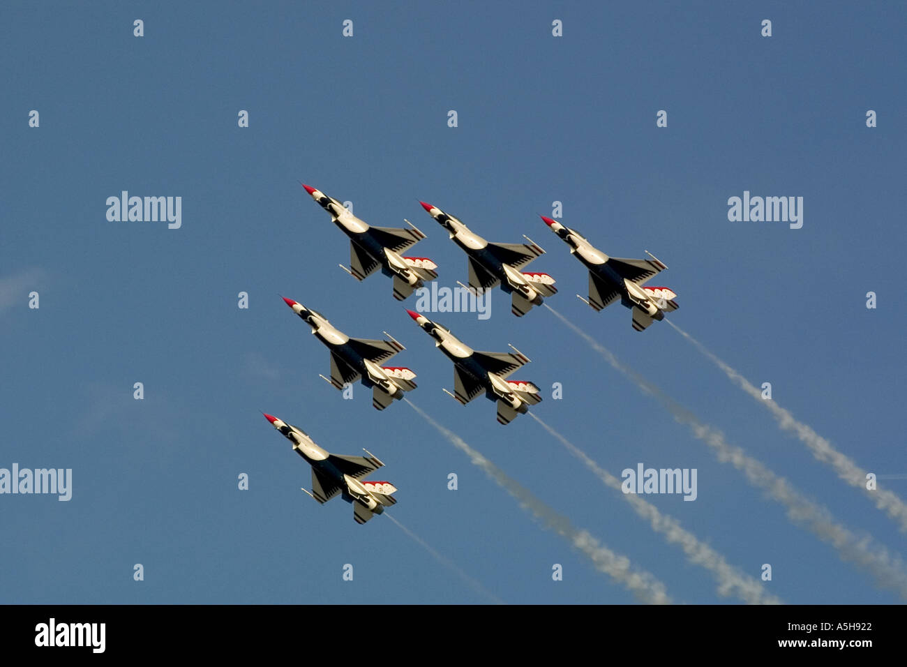 United States Air Force Thunderbirds team flying in triangle formation ...