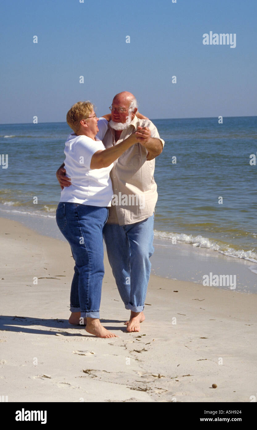 Couple Dancing on Beach Stock Photo - Alamy