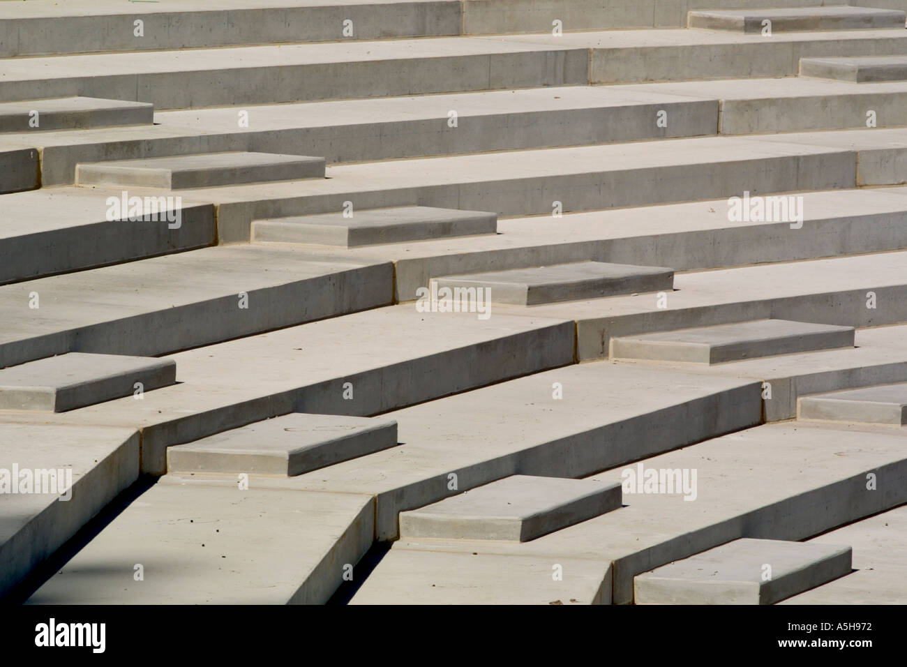 Concrete riser steps for bleachers in sports stadium under construction ...