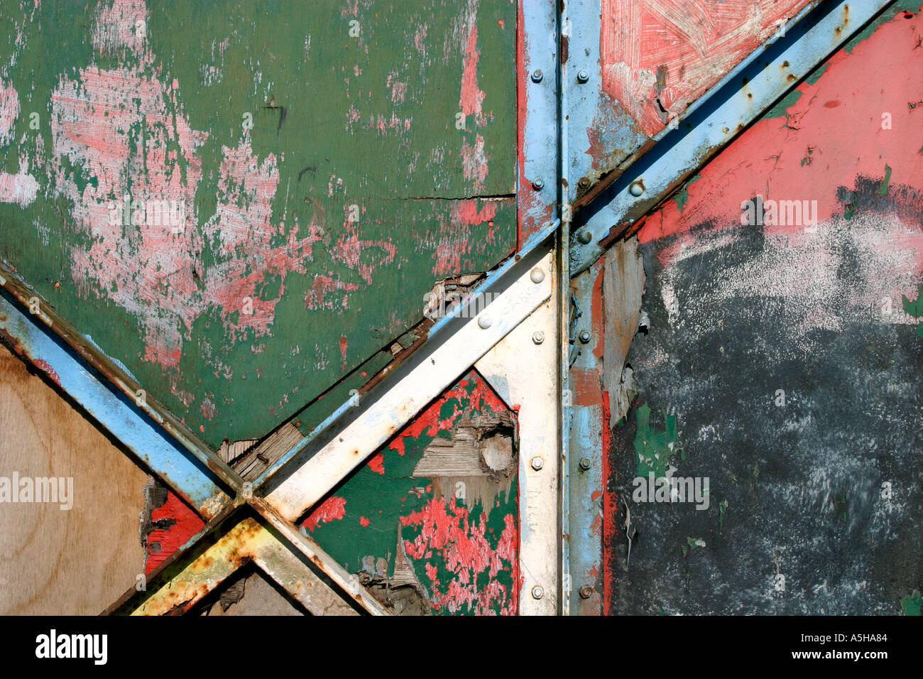 Interesting shapes colours and textures on the sides of old shipping ...