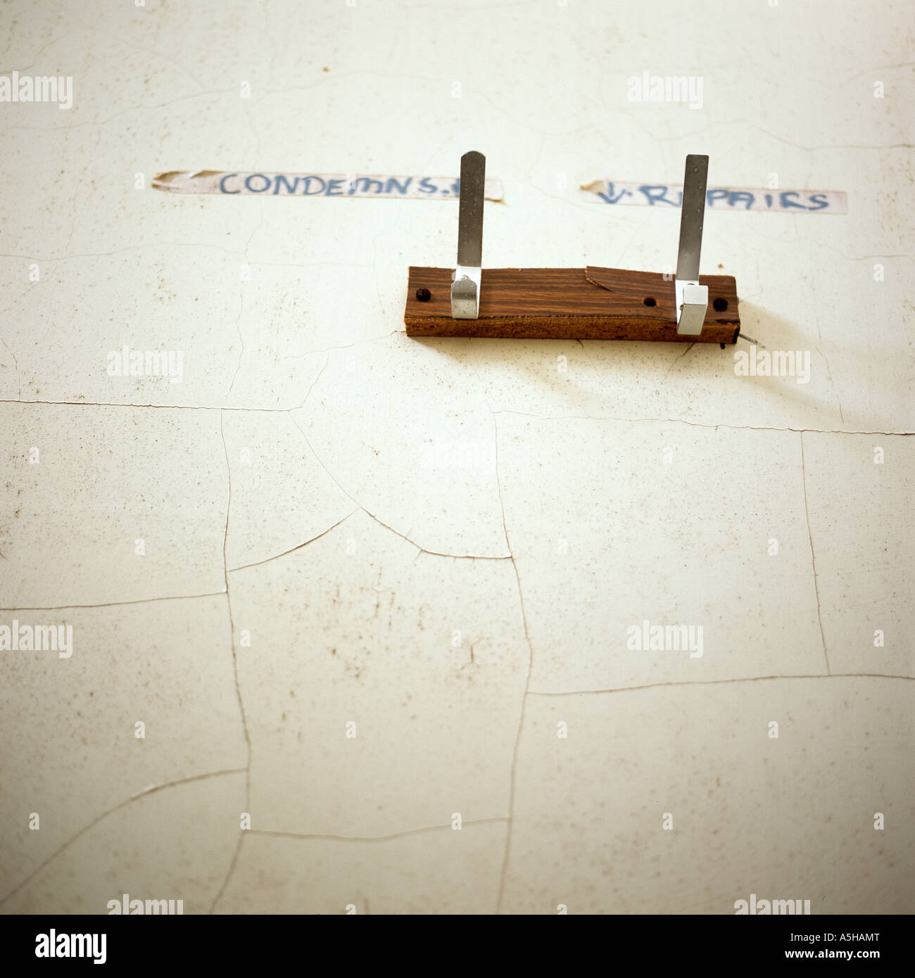 Hooks in empty building Stock Photo - Alamy