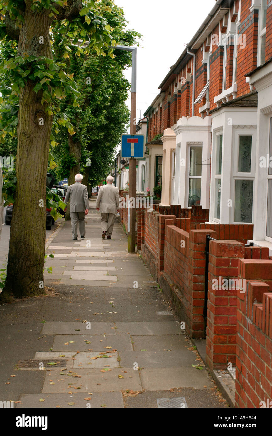 Two business men walk together down a dead end street Stock Photo - Alamy