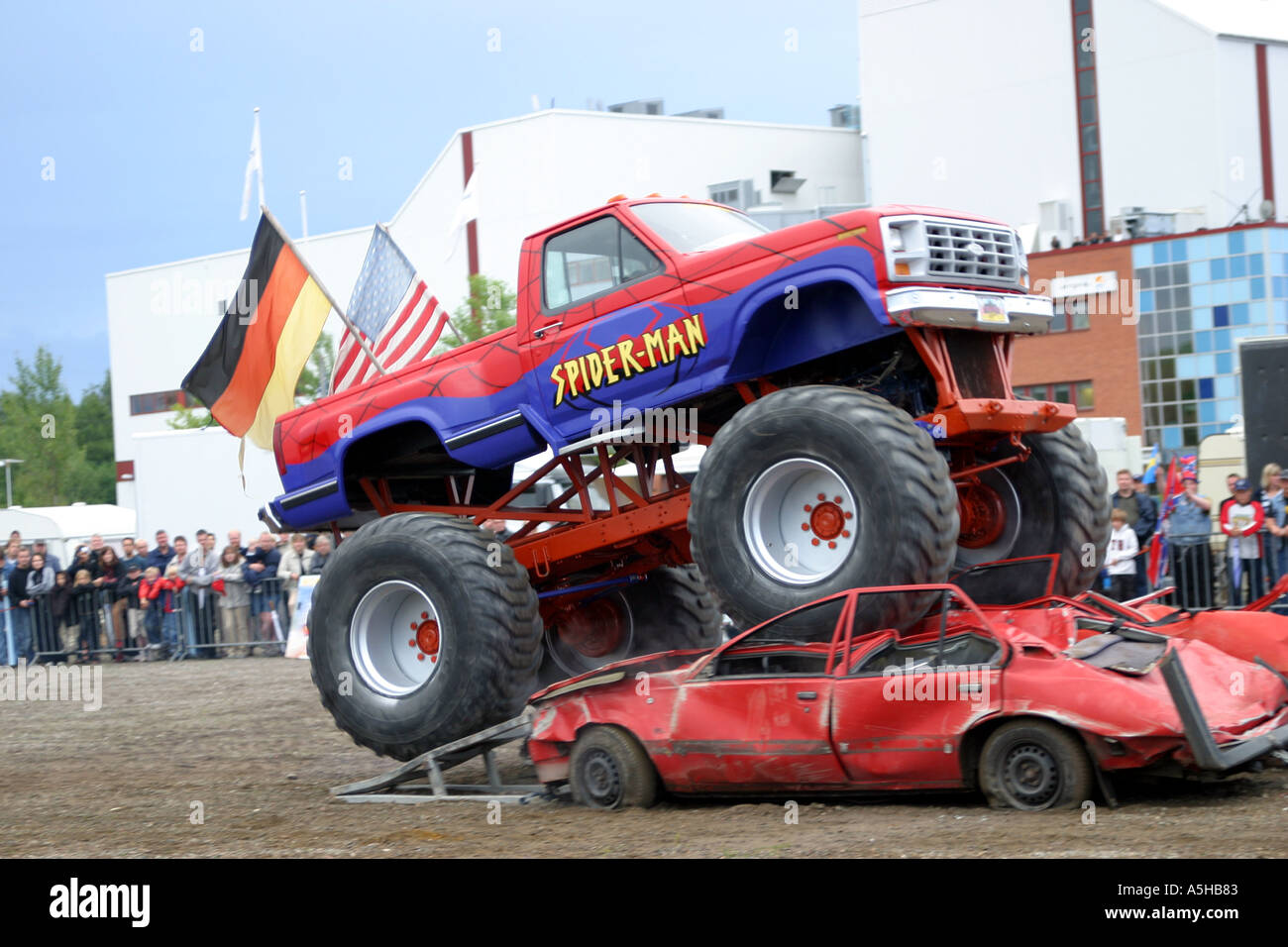 Monster truck crushing cars hi-res stock photography and images - Alamy