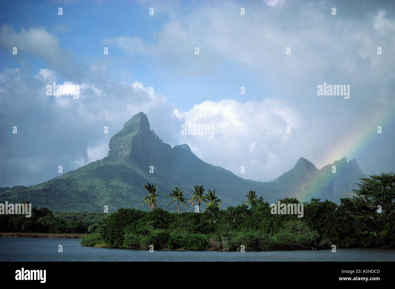 rainbow at tamarin bay trois mamelles mountains mauritius Stock Photo ...
