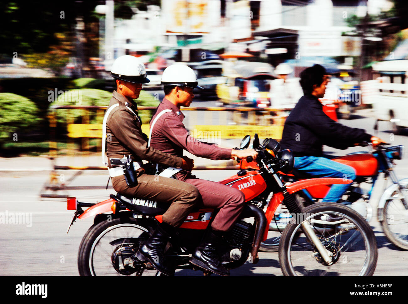 Policeman in slow motion gun hi-res stock photography and images - Alamy