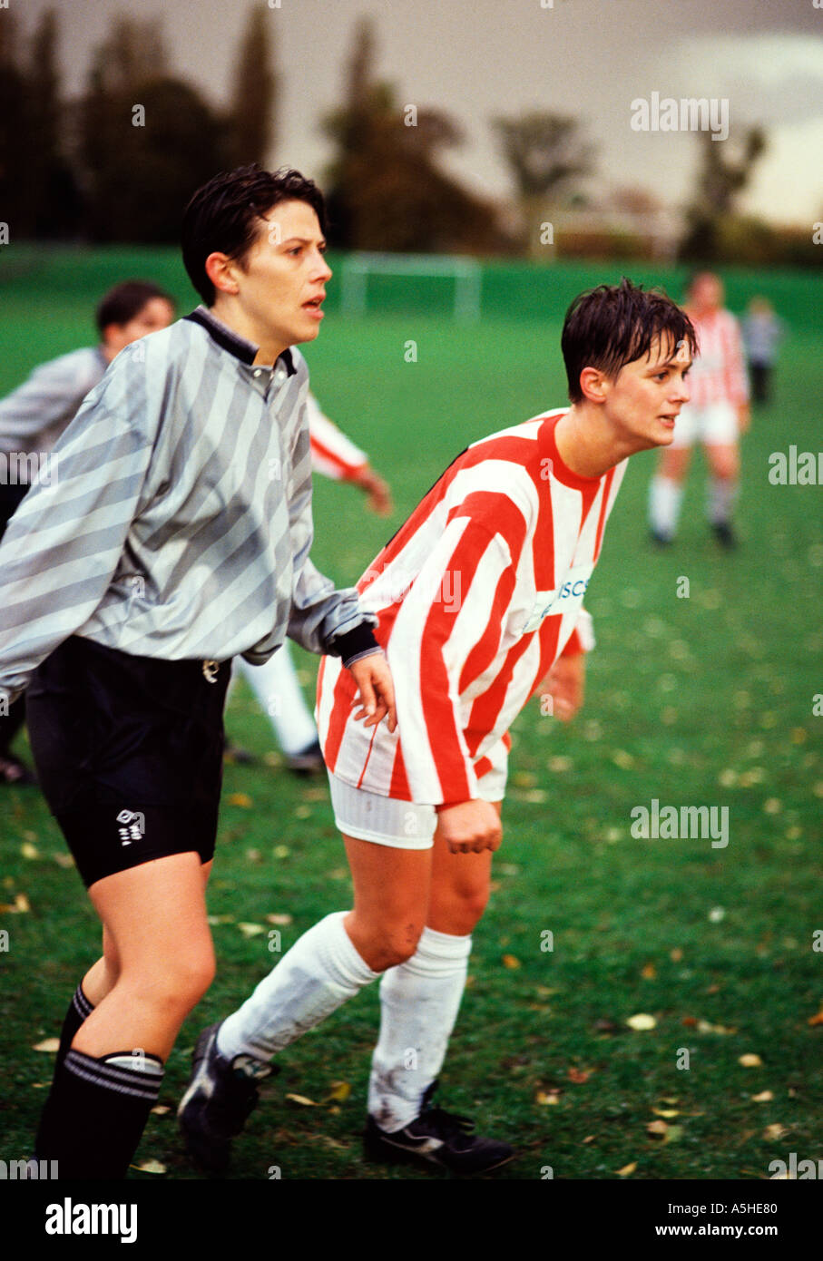 WOMEN playing football Stock Photo - Alamy