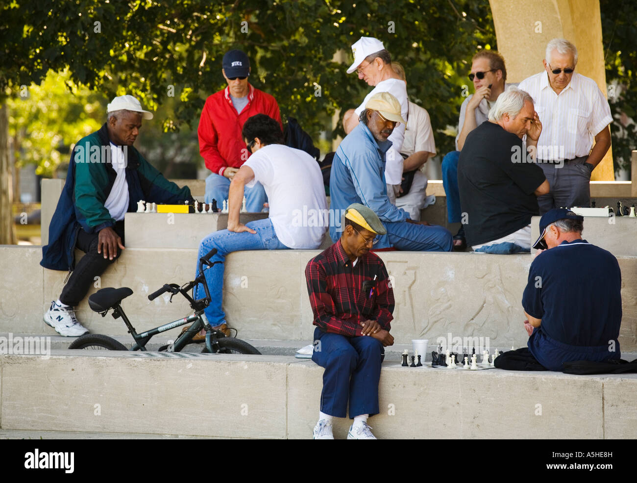 ILLINOIS Chicago Several men play chess and watch at Chess Pavilion ...