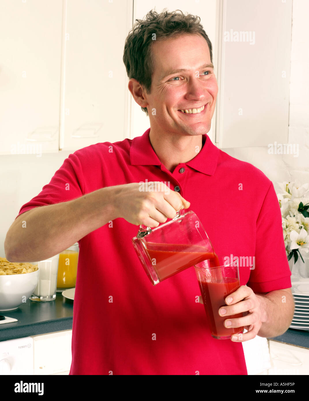Man drinking tomato juice hi-res stock photography and images - Alamy