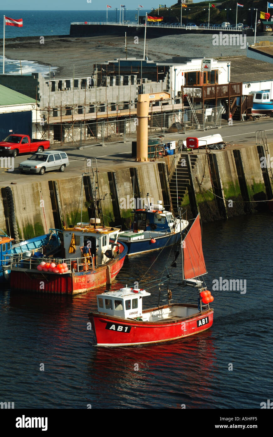 Aberystwyth harbour fishing boat setting sail Stock Photo - Alamy