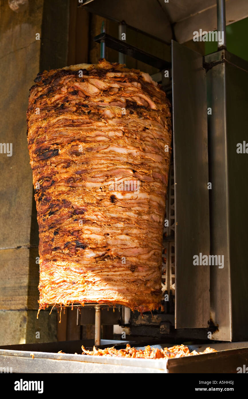 MEXICO Guanajuato Cooked meat on spit ready for slicing gyros Stock ...