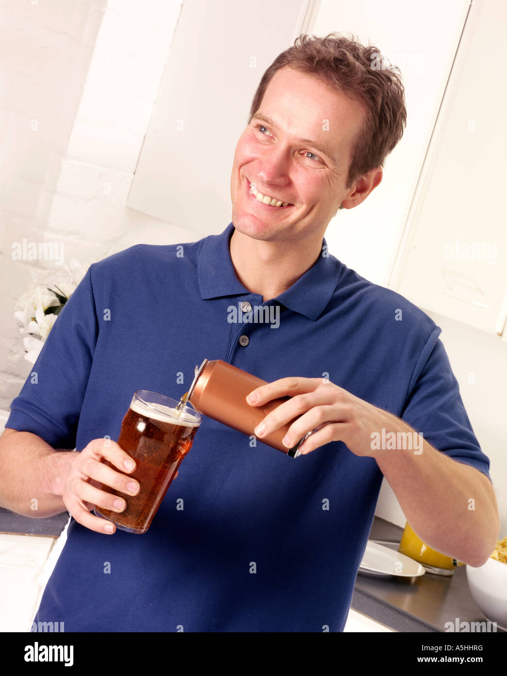 Man holding can beer real hi-res stock photography and images - Alamy