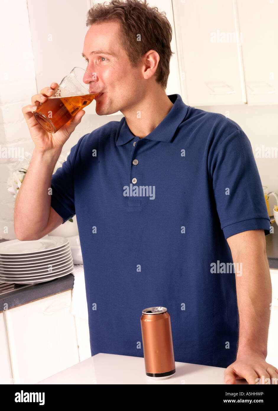 Man holding can beer real hi-res stock photography and images - Alamy