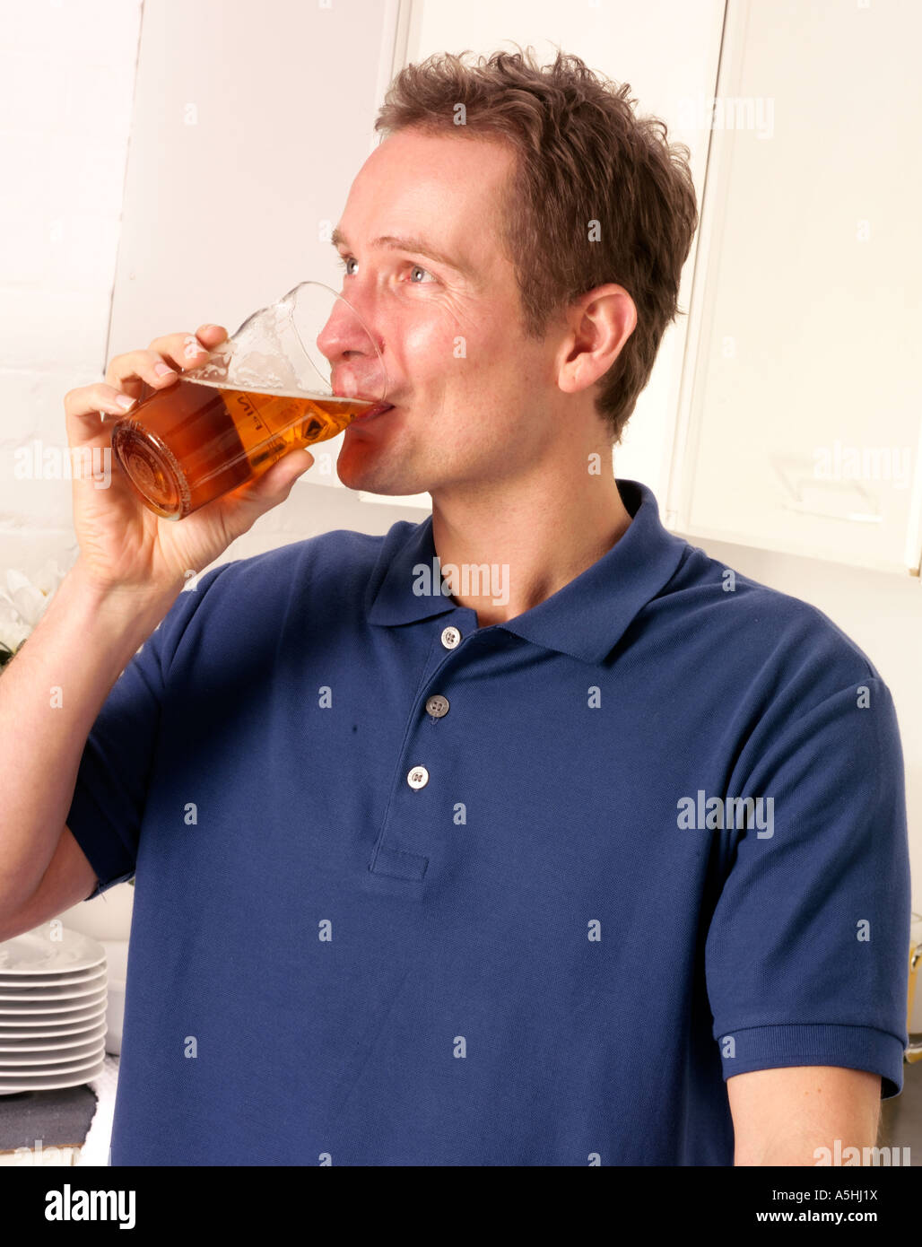 Man holding can beer real hi-res stock photography and images - Alamy