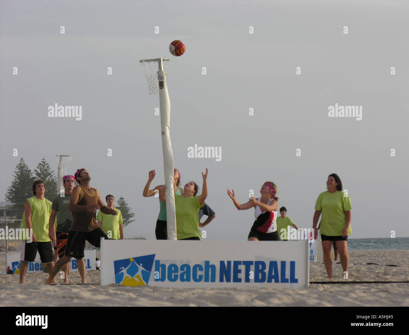Young people playing beach netball Stock Photo - Alamy