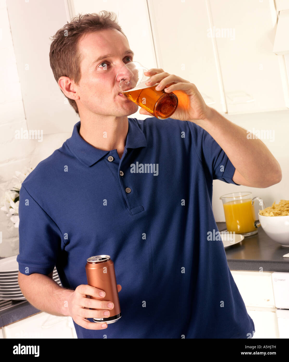 Man holding can beer real hi-res stock photography and images - Alamy