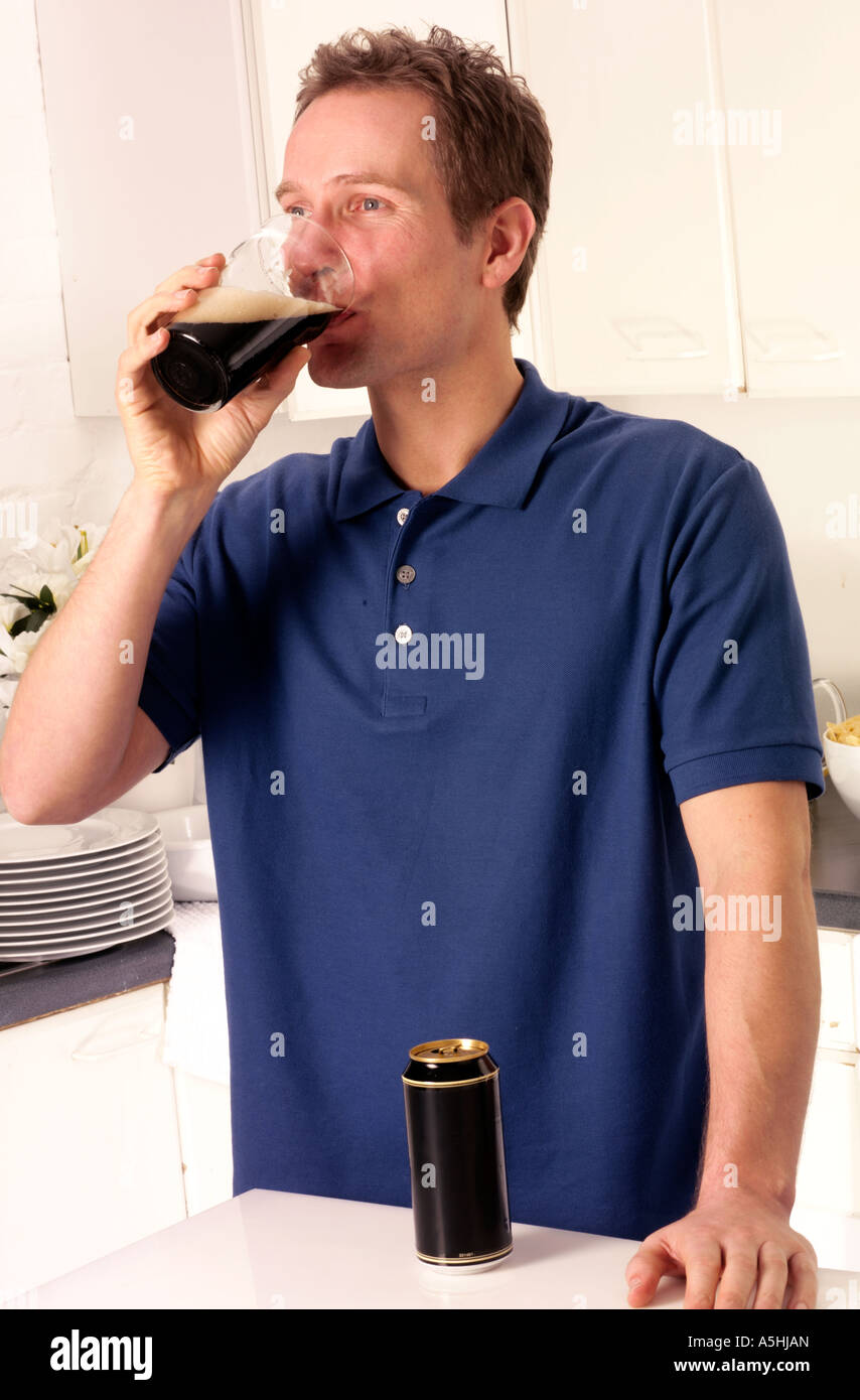 Young man drinking guinness beer hi-res stock photography and images ...