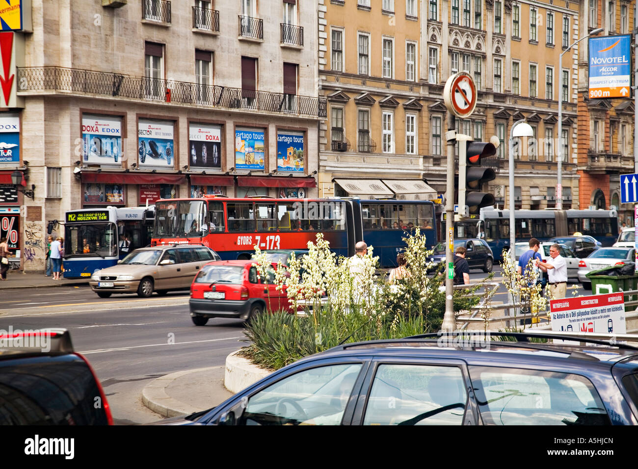 HUNGARY Budapest Buses and cars on busy city street traffic signs and ...