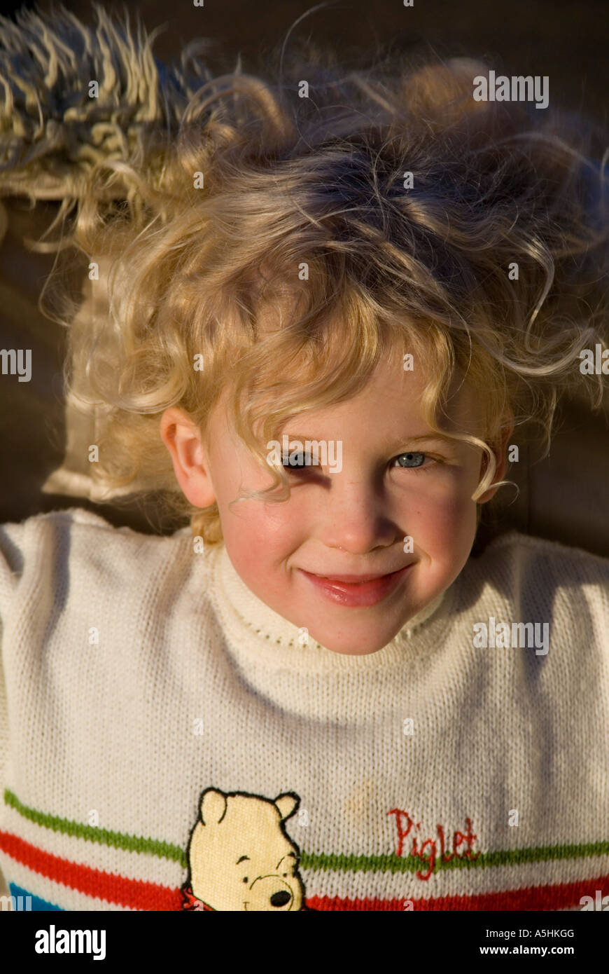 girl child smiling happily portrait Stock Photo - Alamy