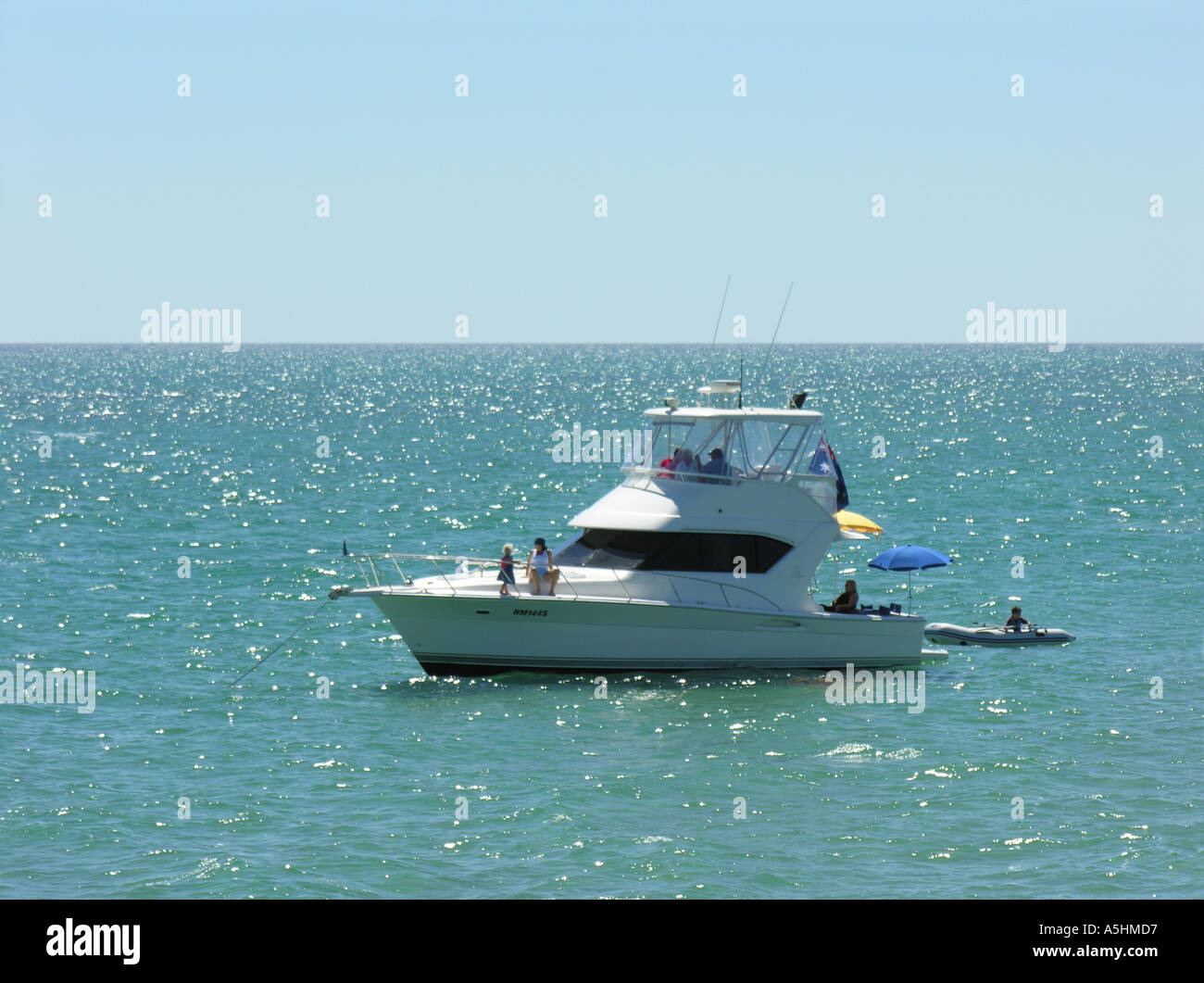 Luxury yacht with people partying Stock Photo - Alamy