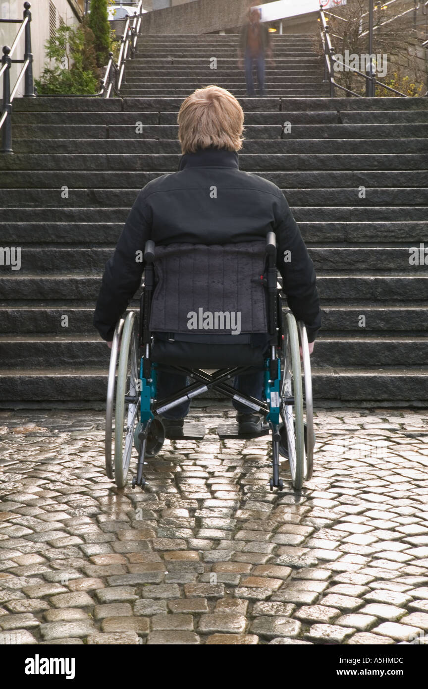 Disabled man at bottom of stairway Stock Photo - Alamy