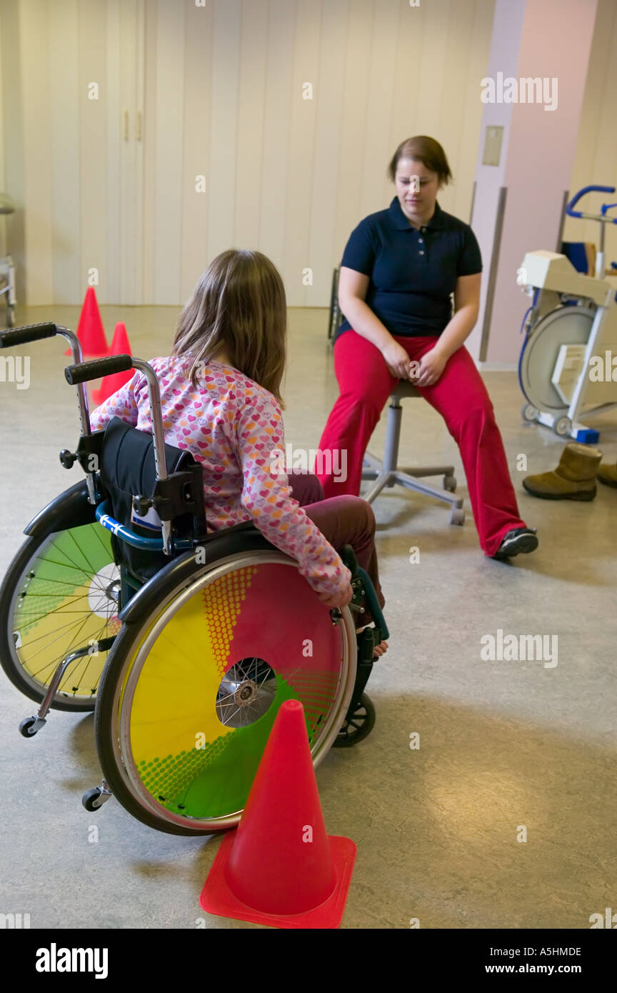 Girl learning wheelchair hi-res stock photography and images - Alamy