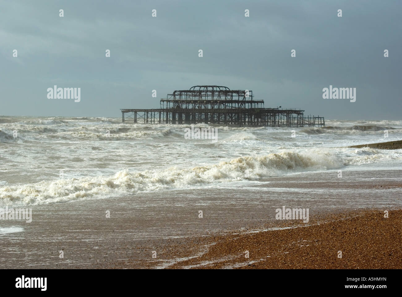 europe uk england sussex brighton wave on beach with west pier Stock ...