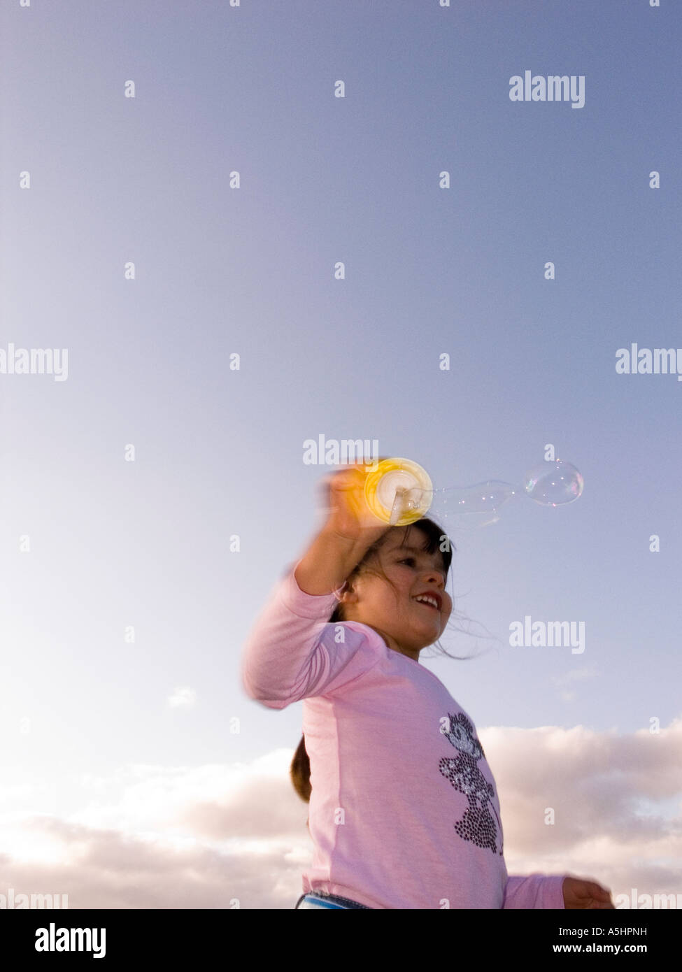 Girl blowing bubbles in water hi-res stock photography and images - Alamy