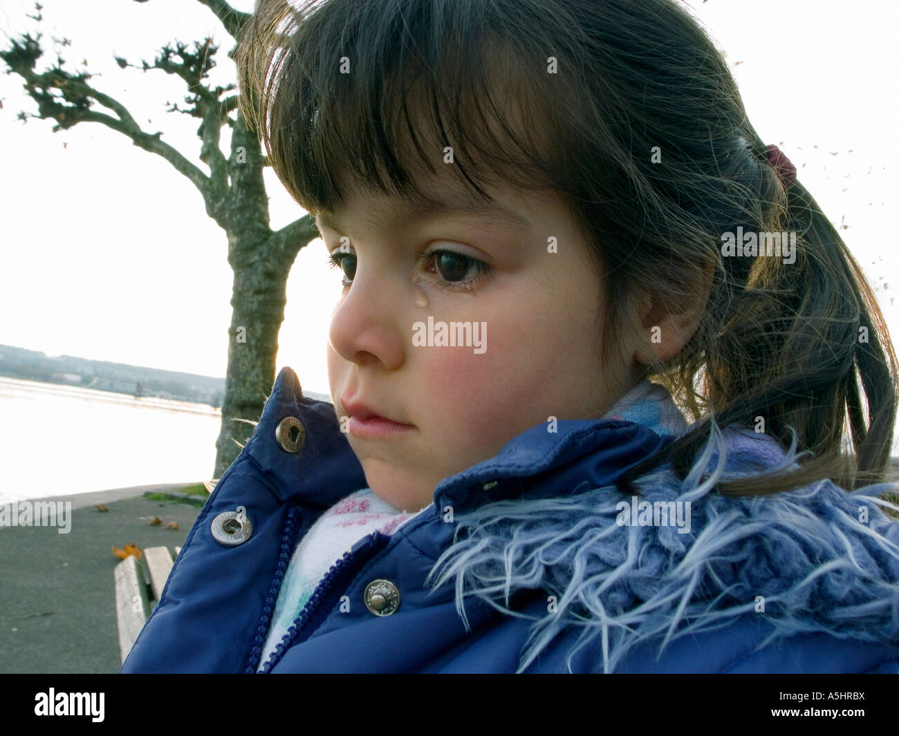 child with tears in her eyes Stock Photo - Alamy
