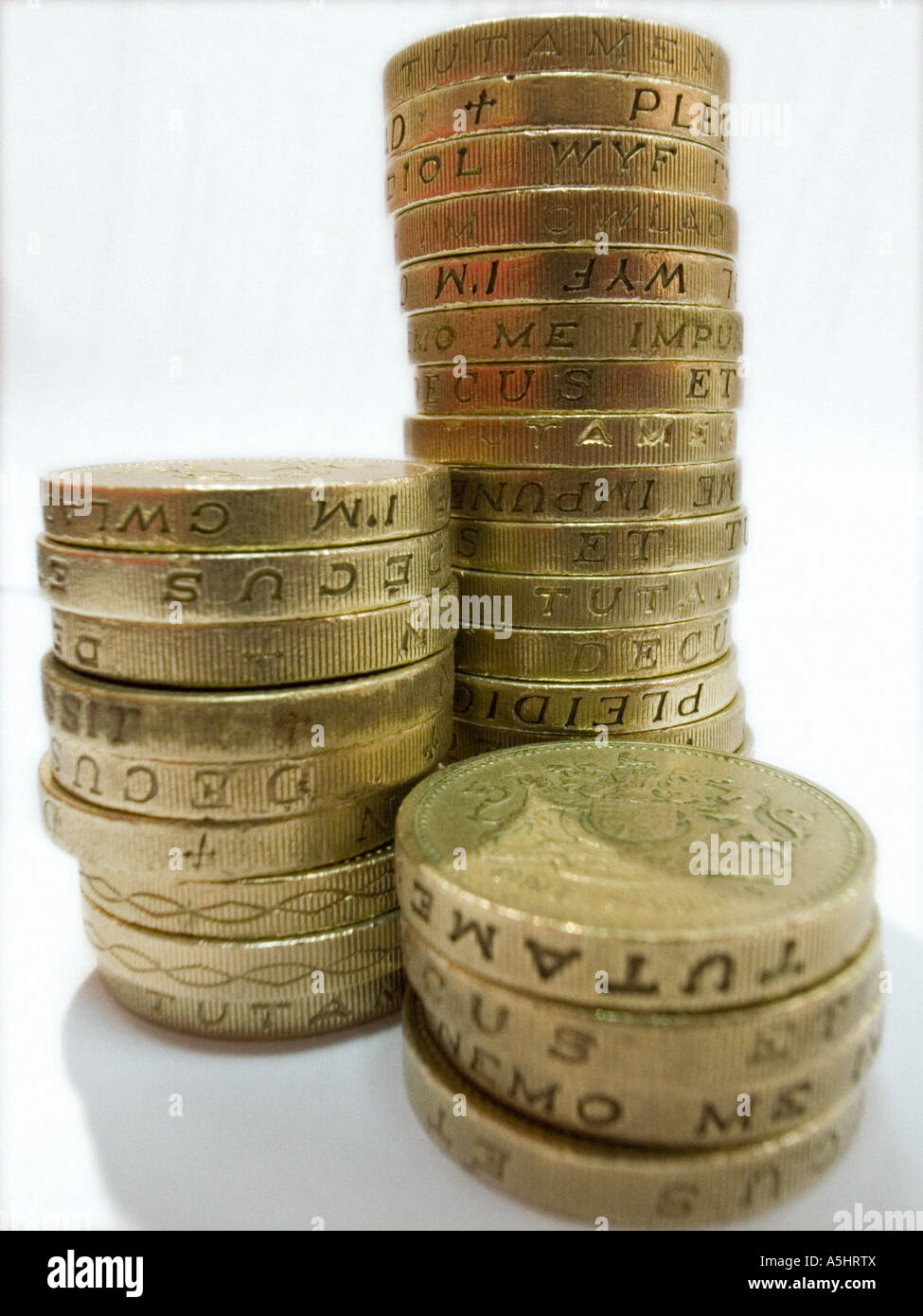 One pound coins-side view Stock Photo - Alamy