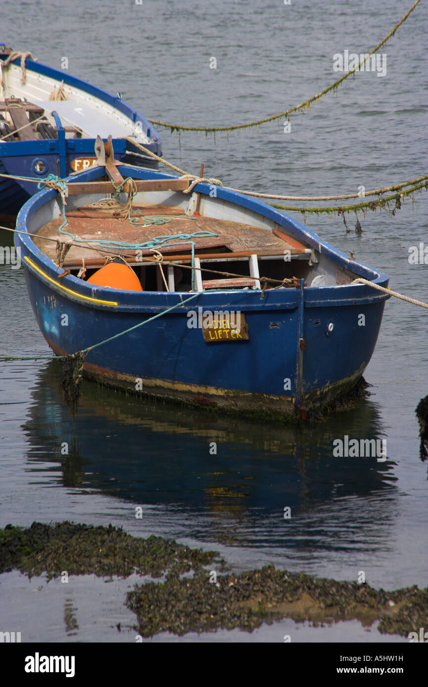 Wooden rowing boat moored at Aberdovey dock Stock Photo - Alamy