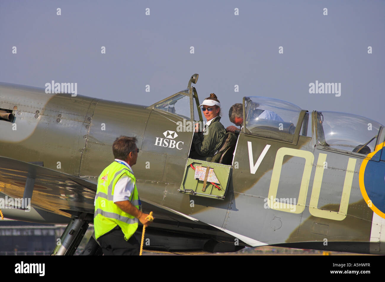 Grace spitfire with pilot Carolyn Grace talking to ground crew waiting ...